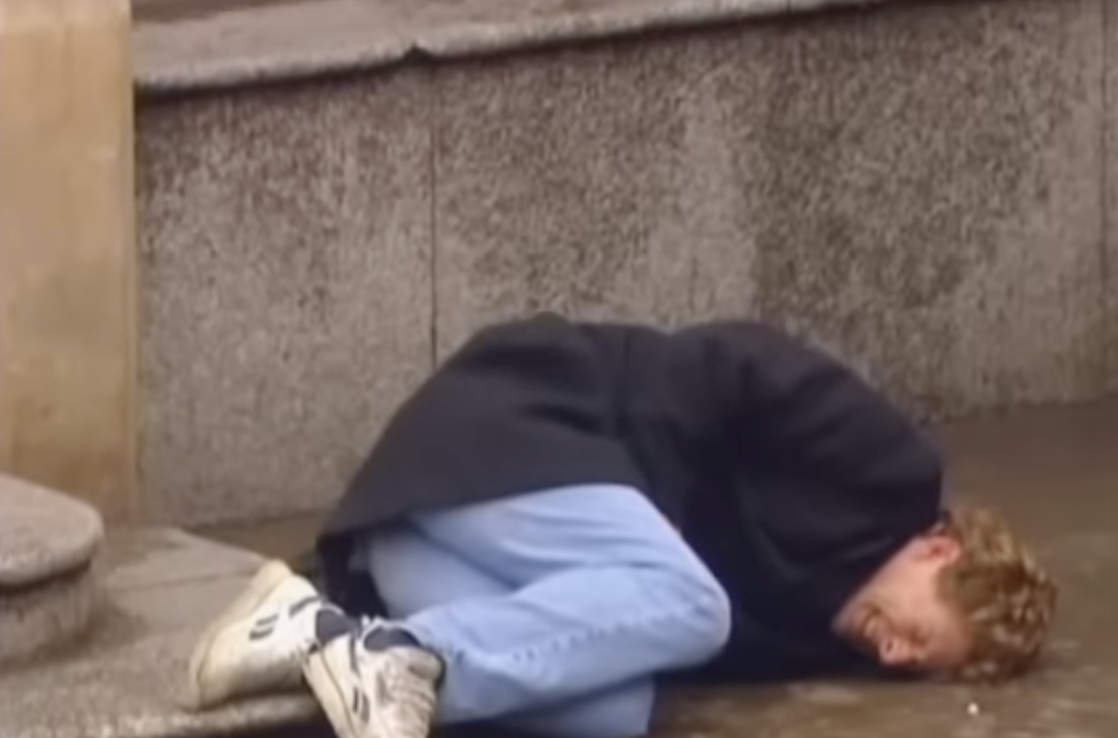 Will Anyone Help? Injured Man Collapses on Crowded Street